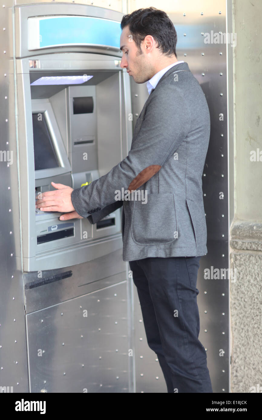 Man at the ATM Stock Photo - Alamy