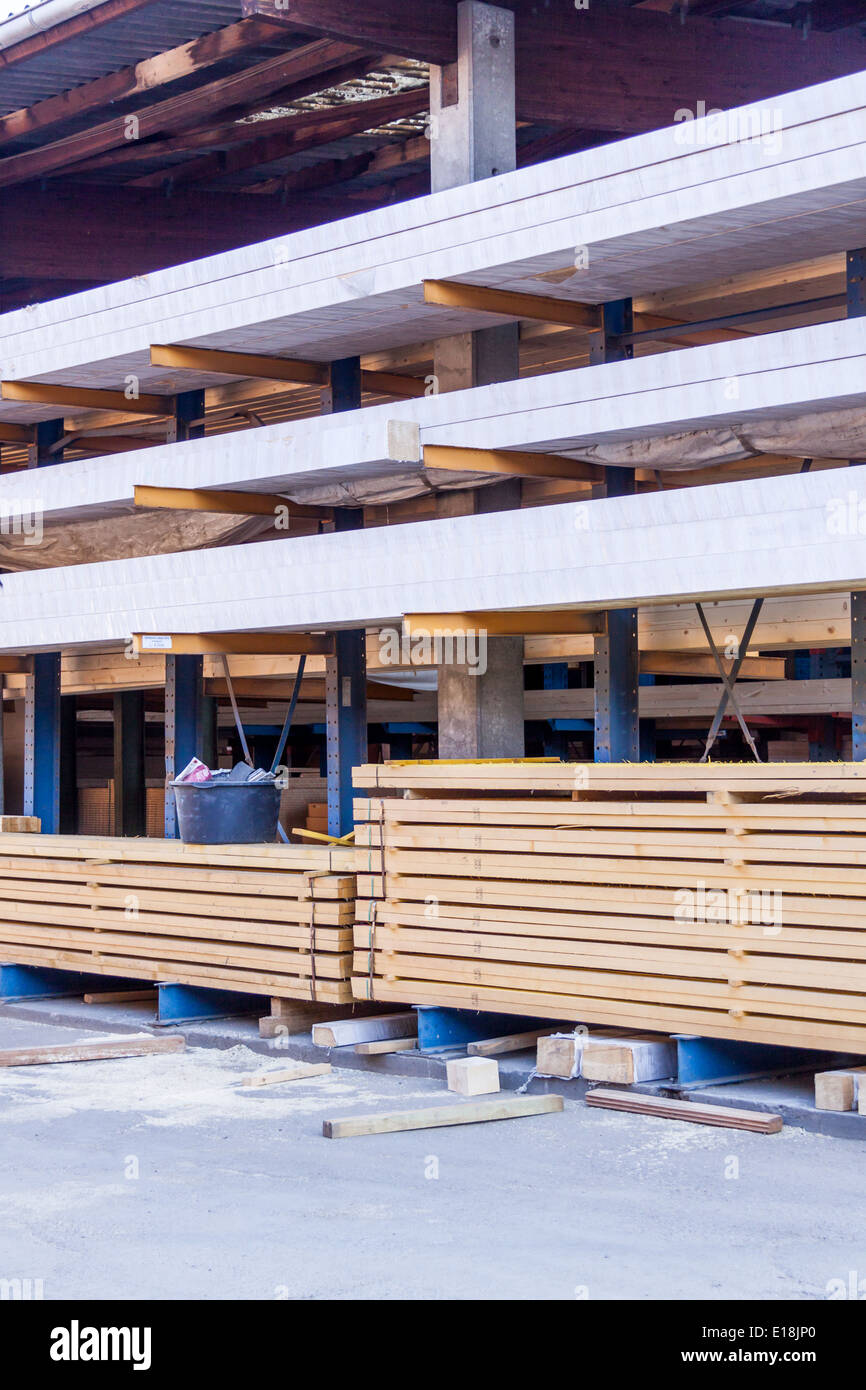 Wooden panels stored inside a warehouse Stock Photo - Alamy
