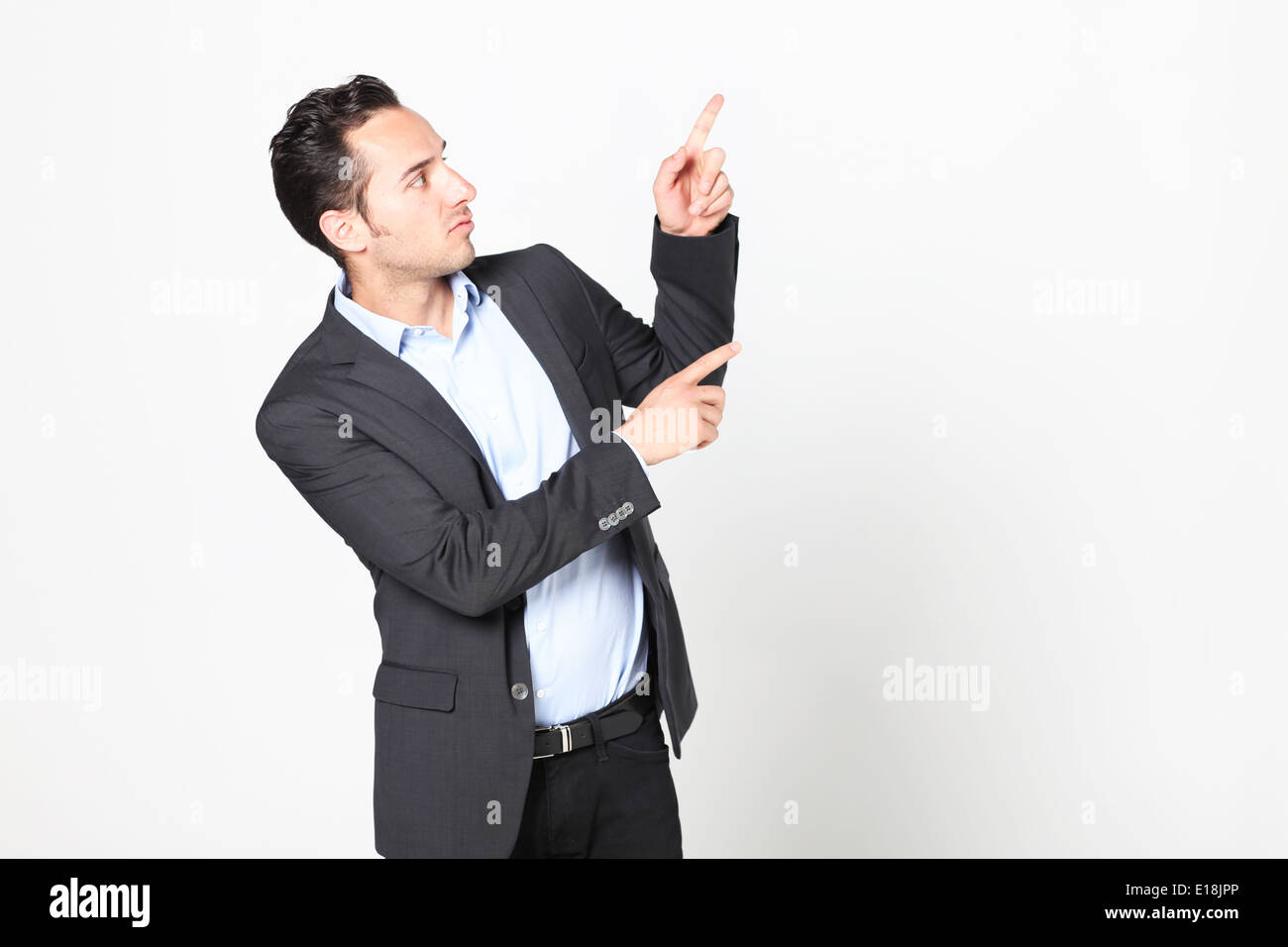man pointing to his left Stock Photo - Alamy