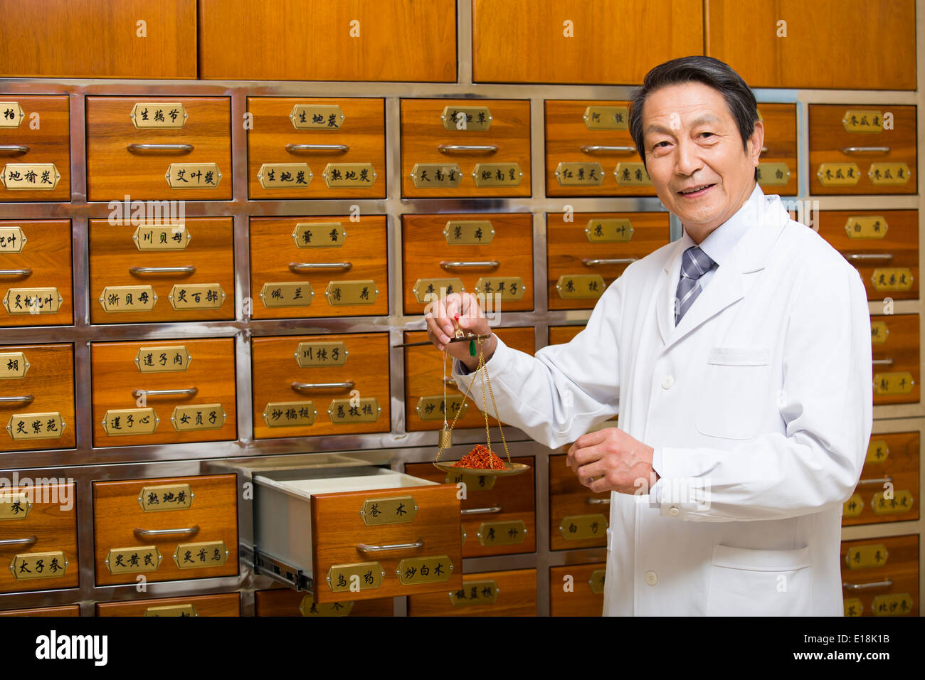 Senior doctor fill the prescription Stock Photo - Alamy