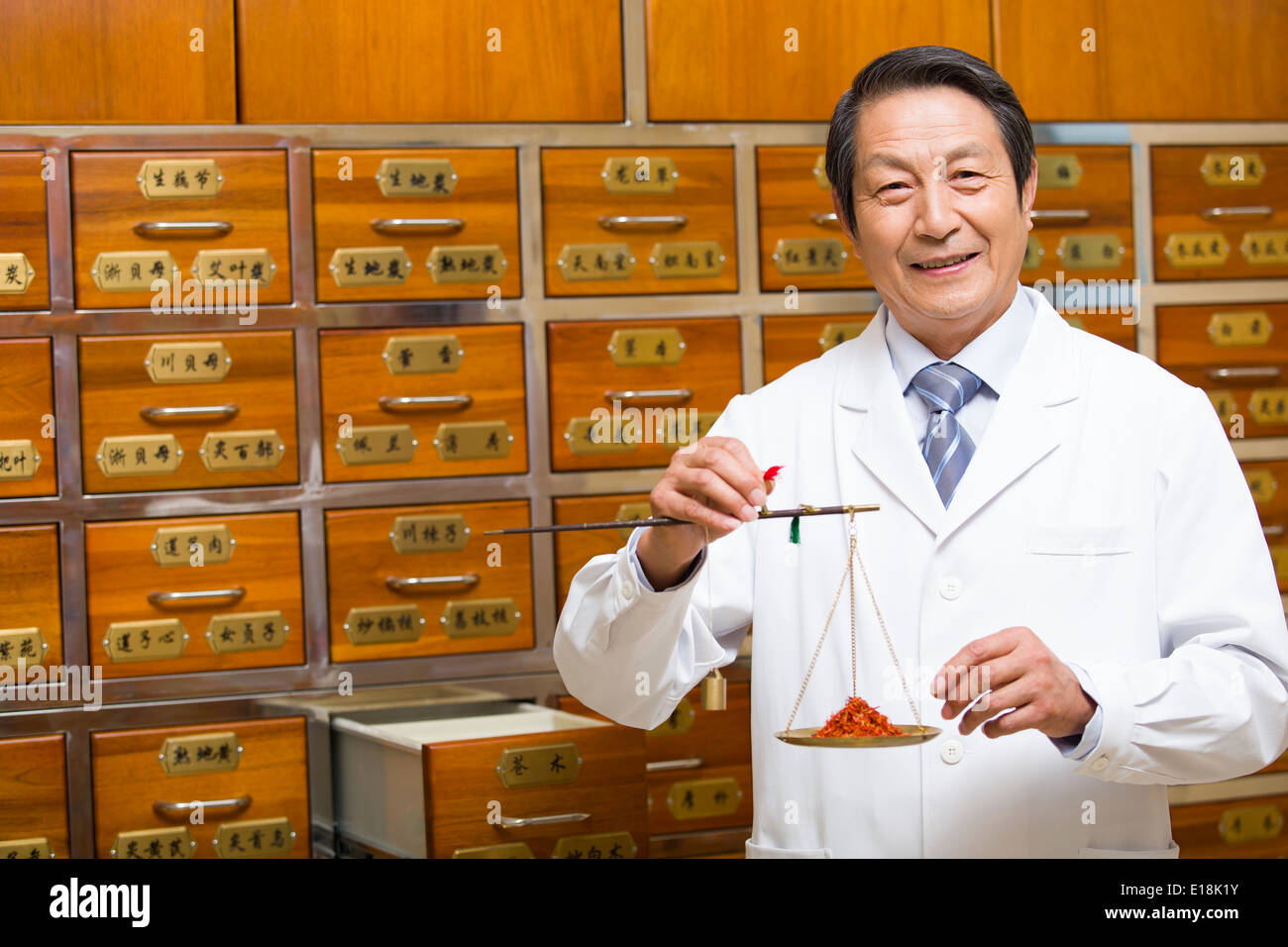 Senior doctor fill the prescription Stock Photo - Alamy