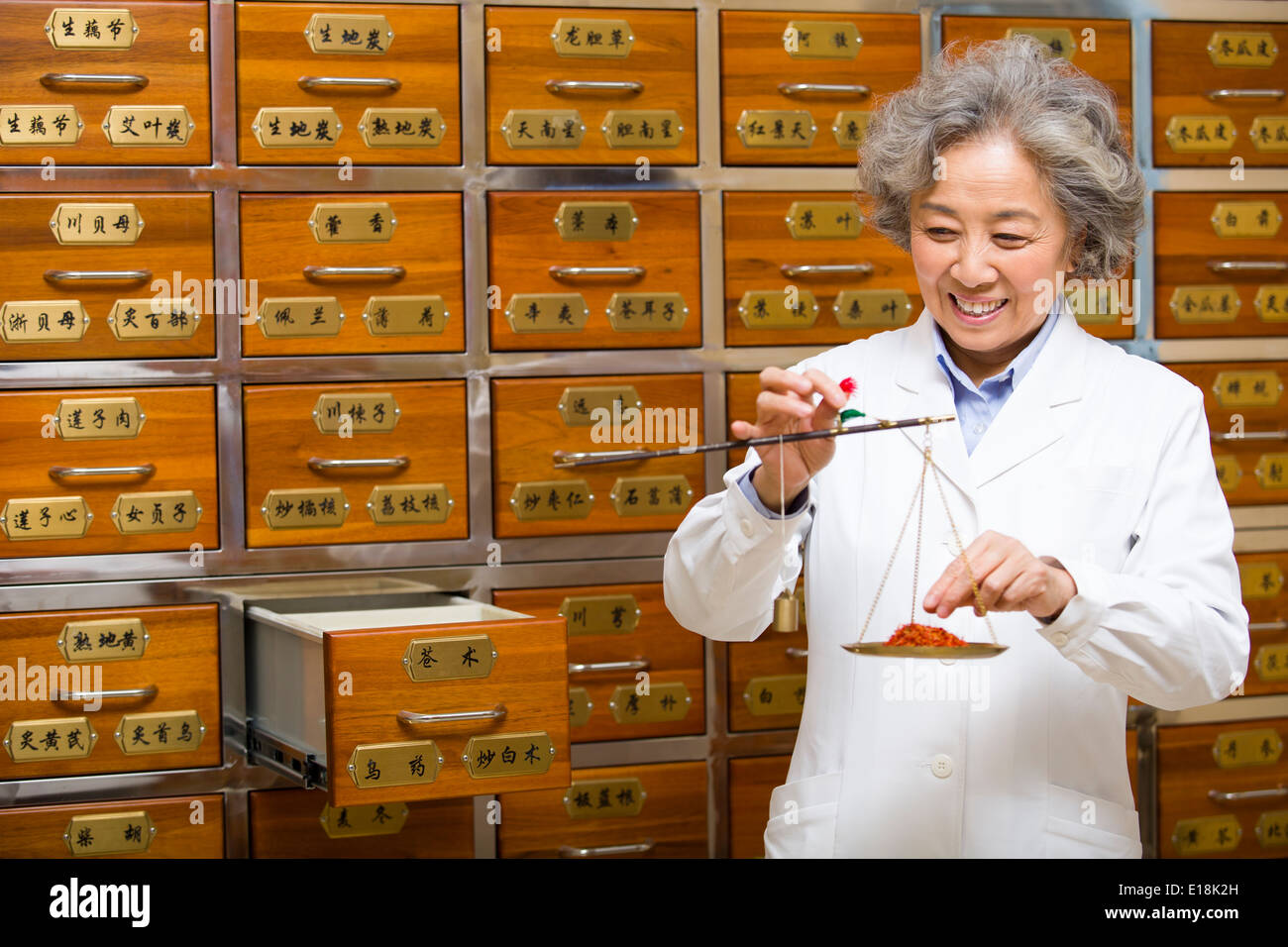 Senior doctor fill the prescription Stock Photo - Alamy