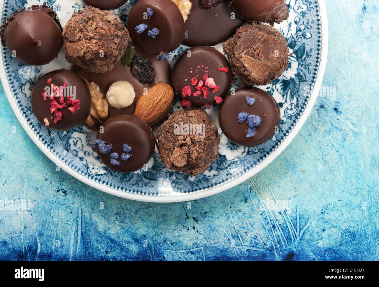 Assortment of fine chocolates dark, and milk chocolate and truffle ...