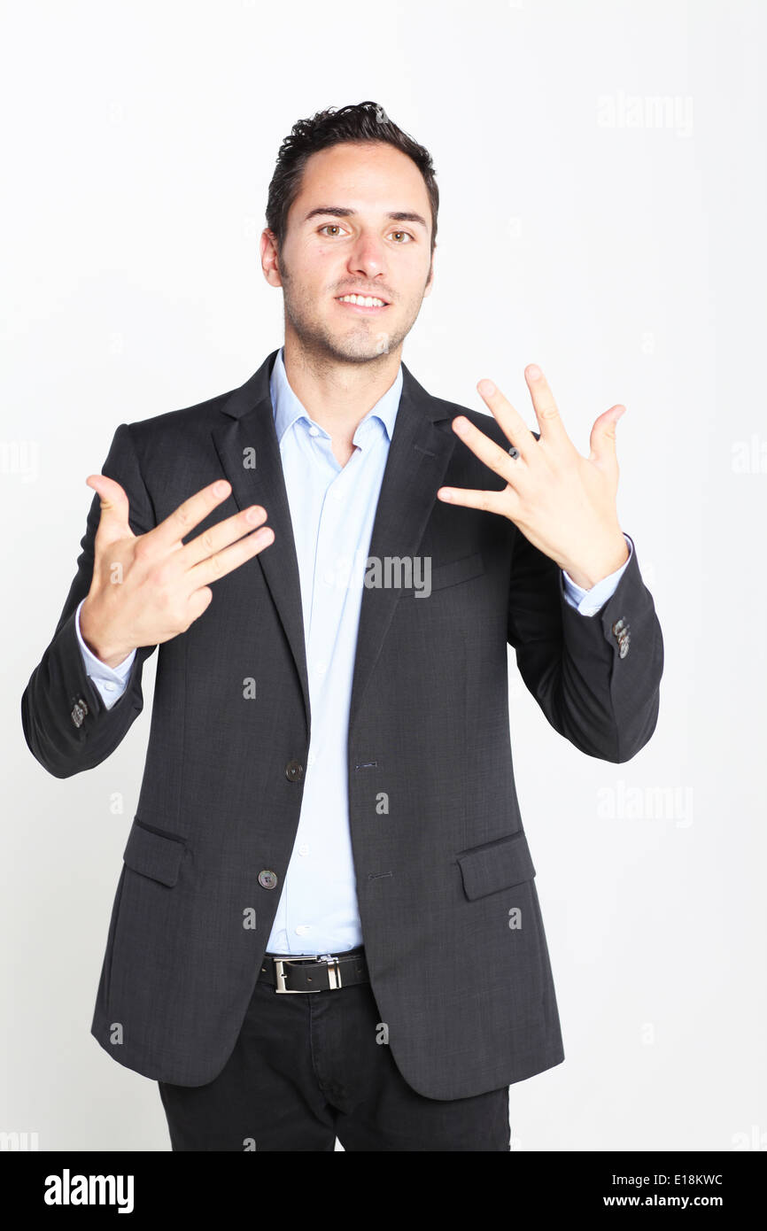 Businessman counting number 9 Stock Photo - Alamy