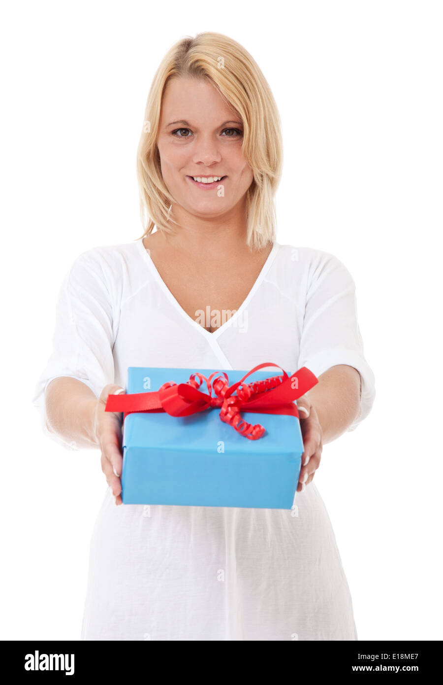 Attractive young woman hands over present Stock Photo - Alamy