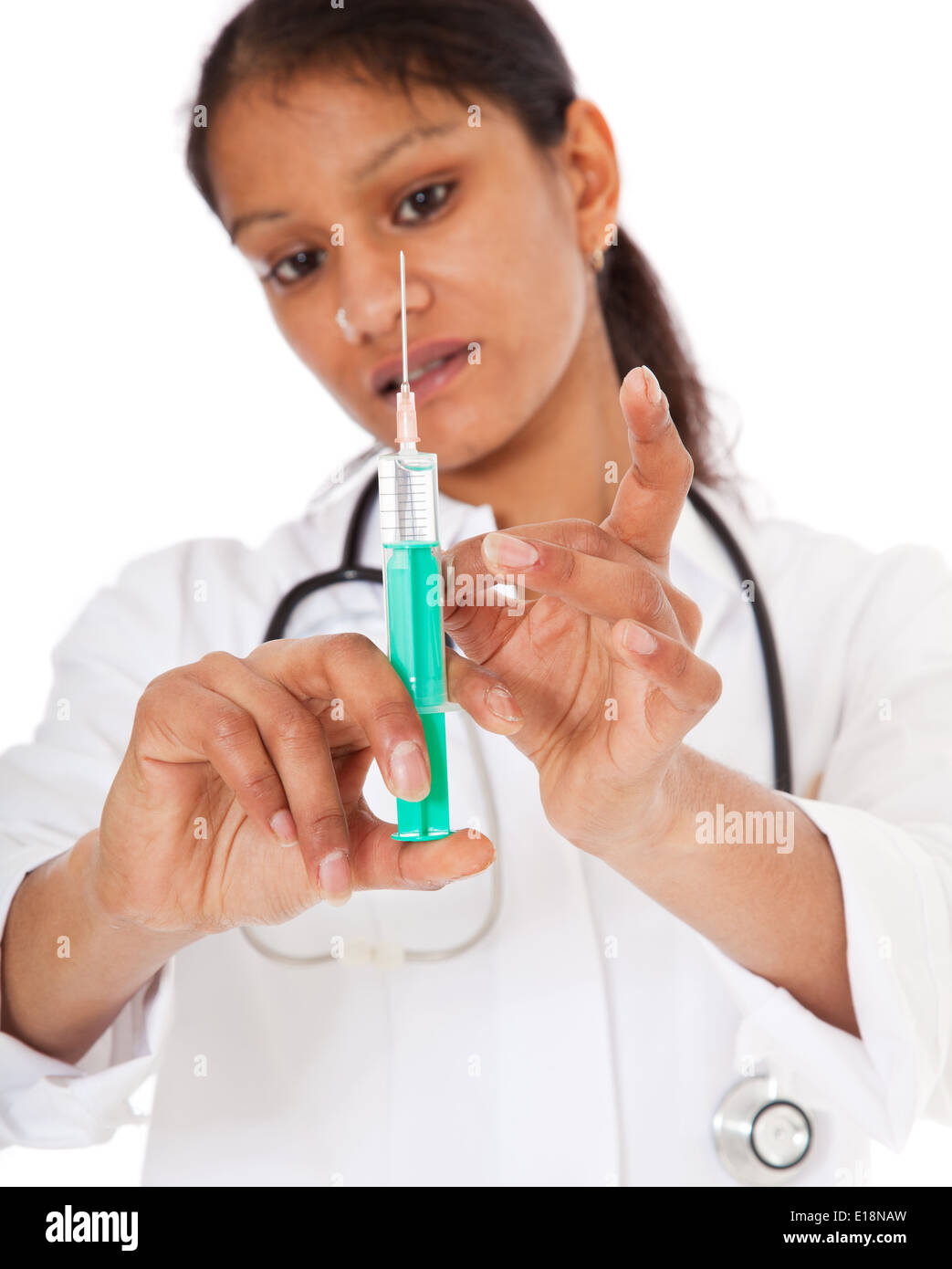 Indian doctor prepares syringe Stock Photo - Alamy
