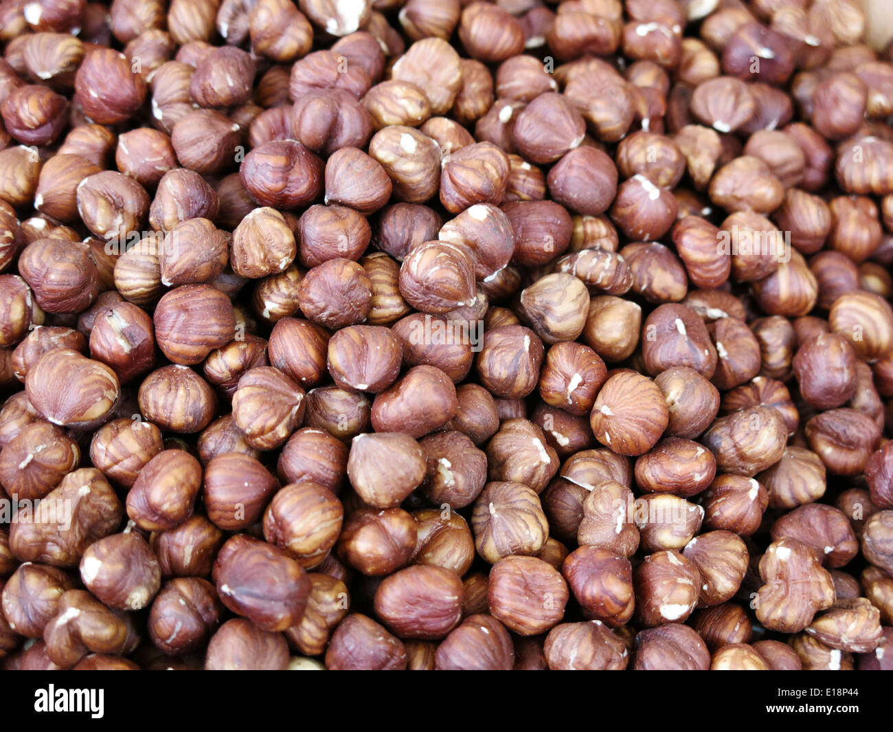 Hazelnut background texture Stock Photo - Alamy