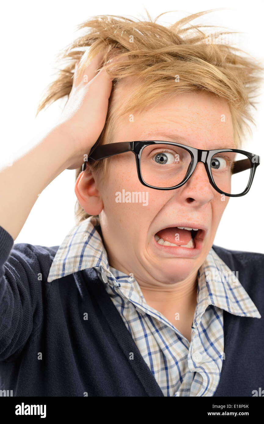 Crazy nerd boy in geek glasses with messy hair shouting against white ...