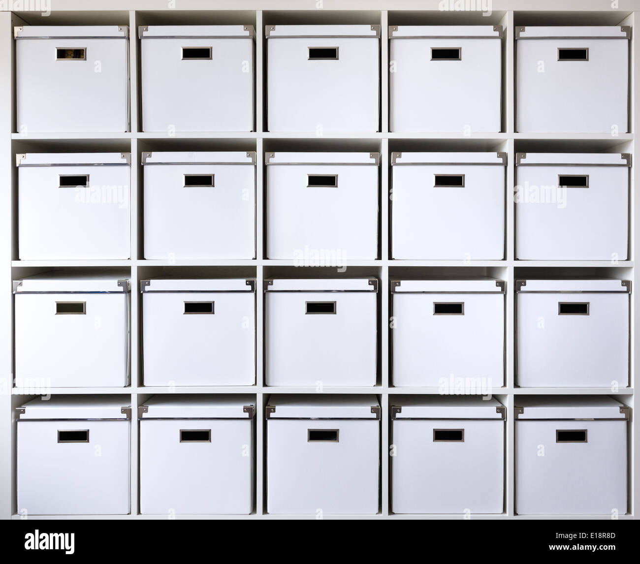 cardboard boxes on shelves Stock Photo - Alamy