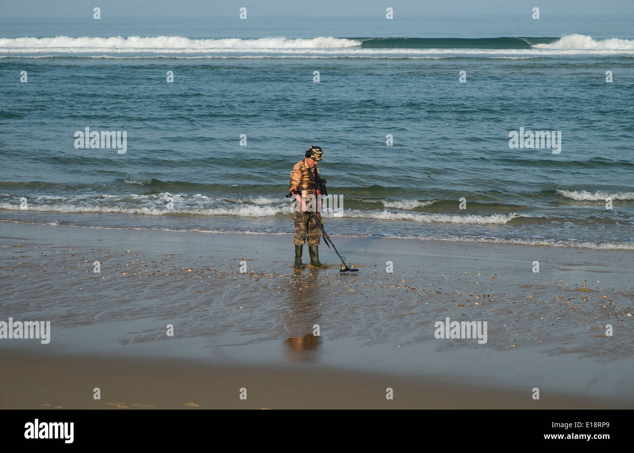 treasure hunter on beach Stock Photo - Alamy