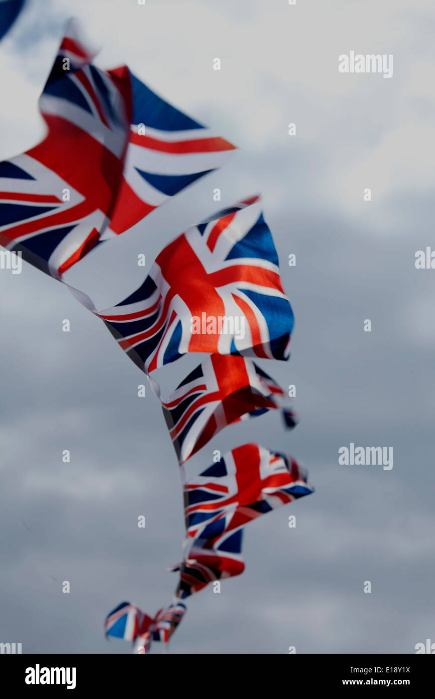 Union Jack Bunting flying on a windy spring day Stock Photo - Alamy