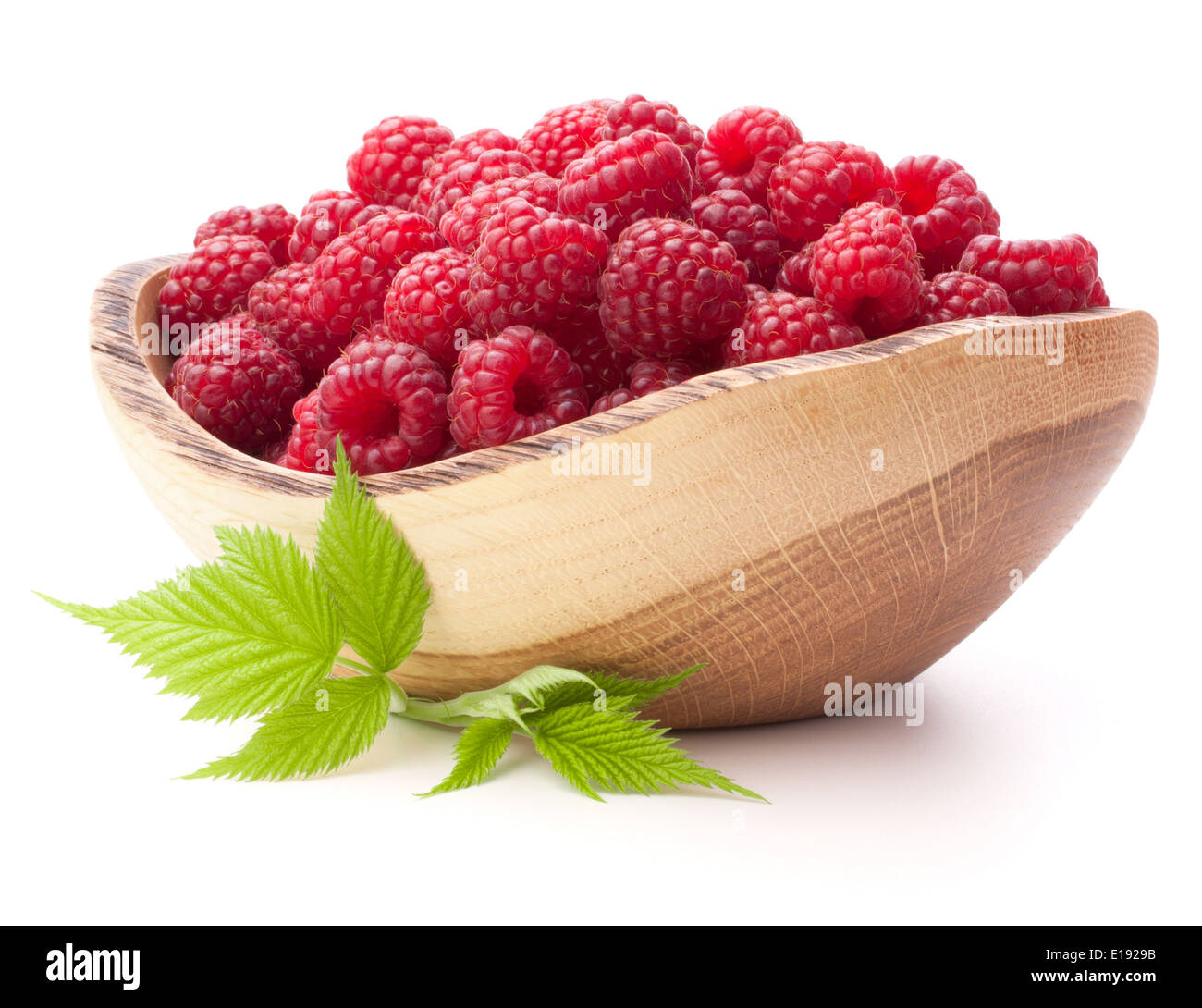 raspberries in wooden bowl isolated on white background cutout Stock ...