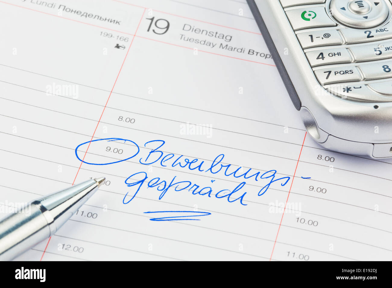 Ein Termin ist in einem Kalender eingetragen: Bewerbungsgespr‰ch Stock ...