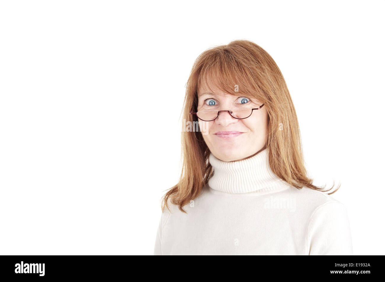 Portrait of a funny female wearing glasses against white background ...
