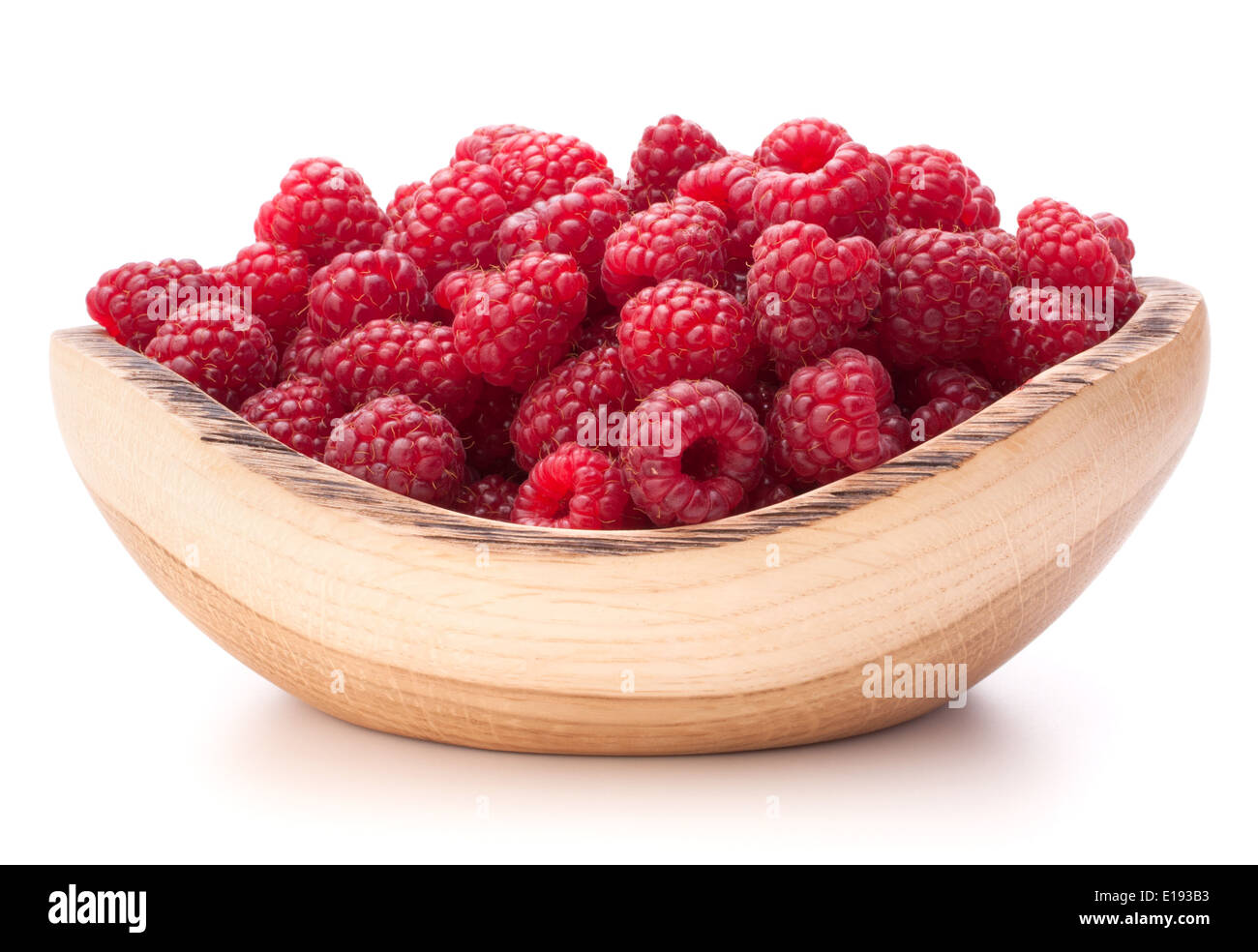 raspberries in wooden bowl isolated on white background cutout Stock ...