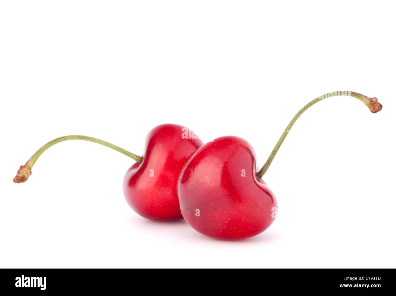 Two heart shaped cherry berries isolated on white background cutout ...