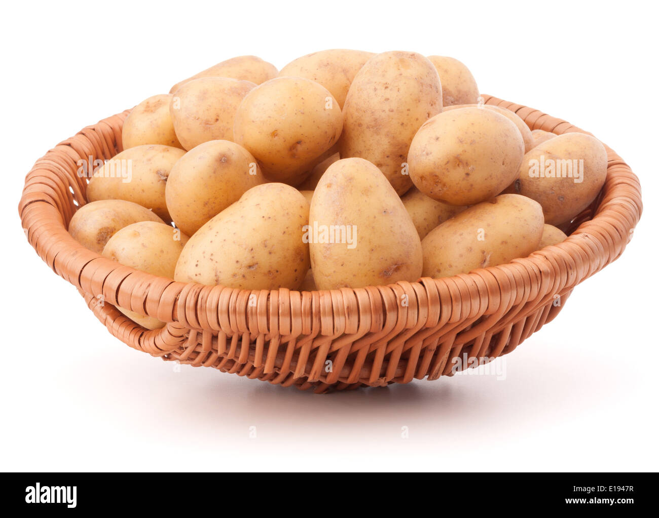 Potato tuber in wicker basket isolated on white background Stock Photo ...