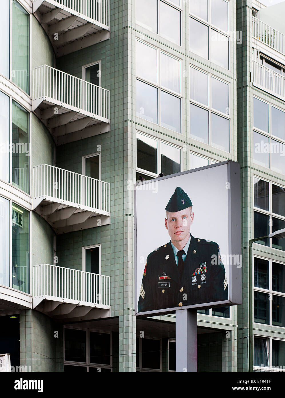 Checkpoint Charlie with photo of American Soldier, Berlin Stock Photo ...