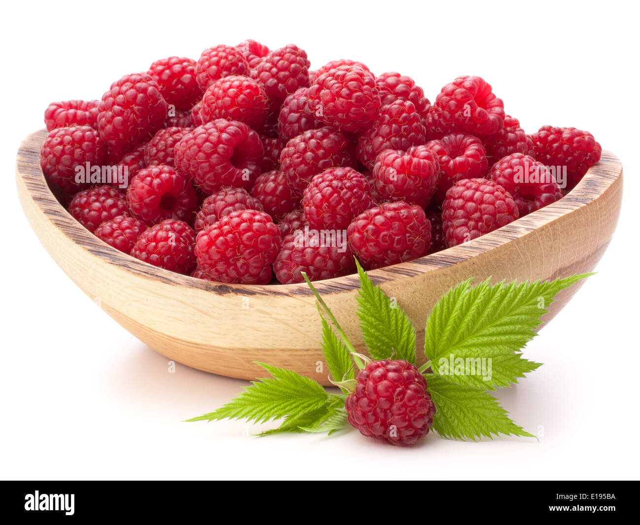 raspberries in wooden bowl isolated on white background cutout Stock ...