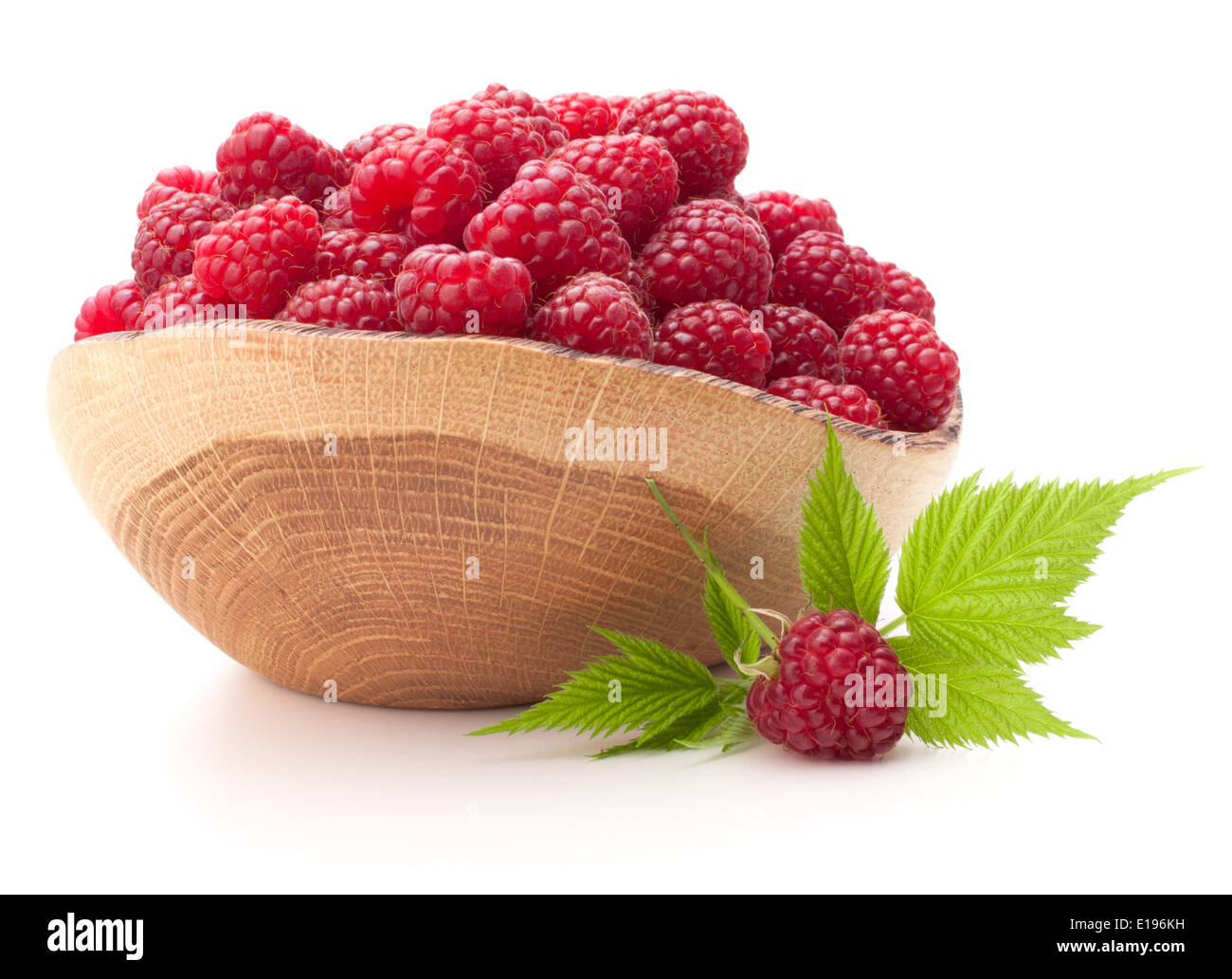 raspberries in wooden bowl isolated on white background cutout Stock ...