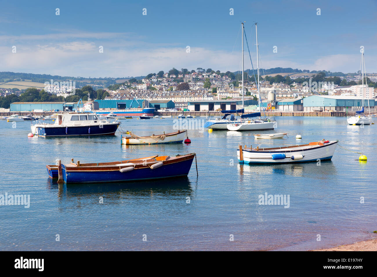 Boats on Teign river Teignmouth Devon tourist town with blue sky a ...