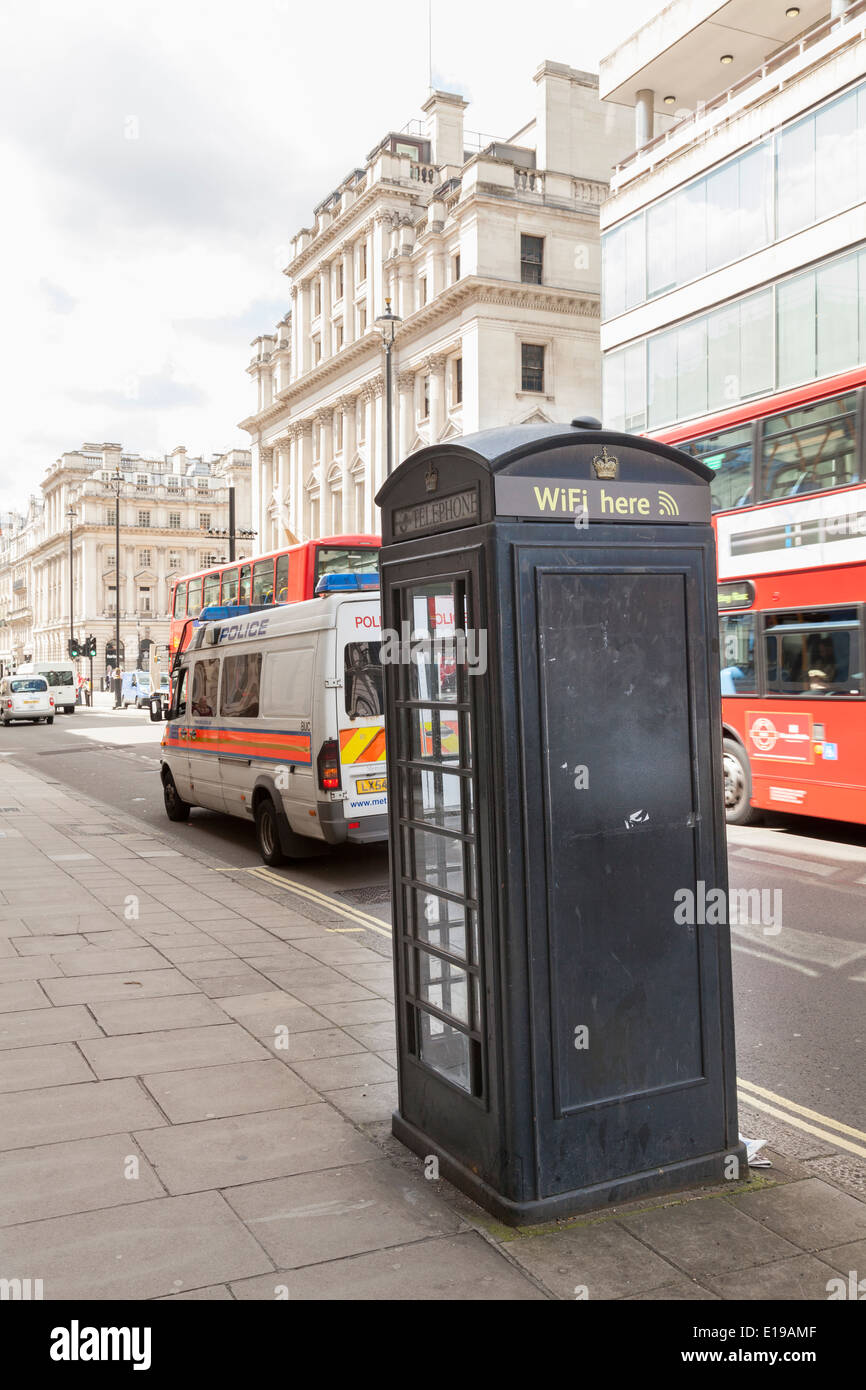 Traditional telephone box converted to WiFi hotspot point in London ...