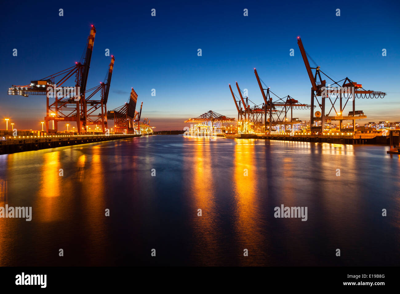 A large container harbor with deep blue night sky Stock Photo - Alamy