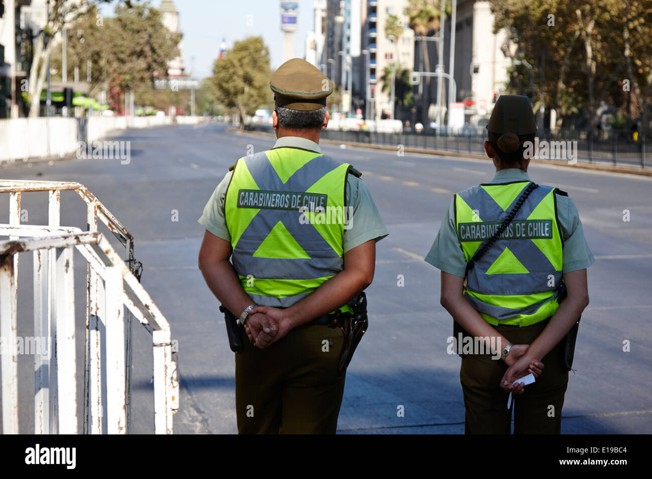 two carabineros de chile national police officers with roads closed ...