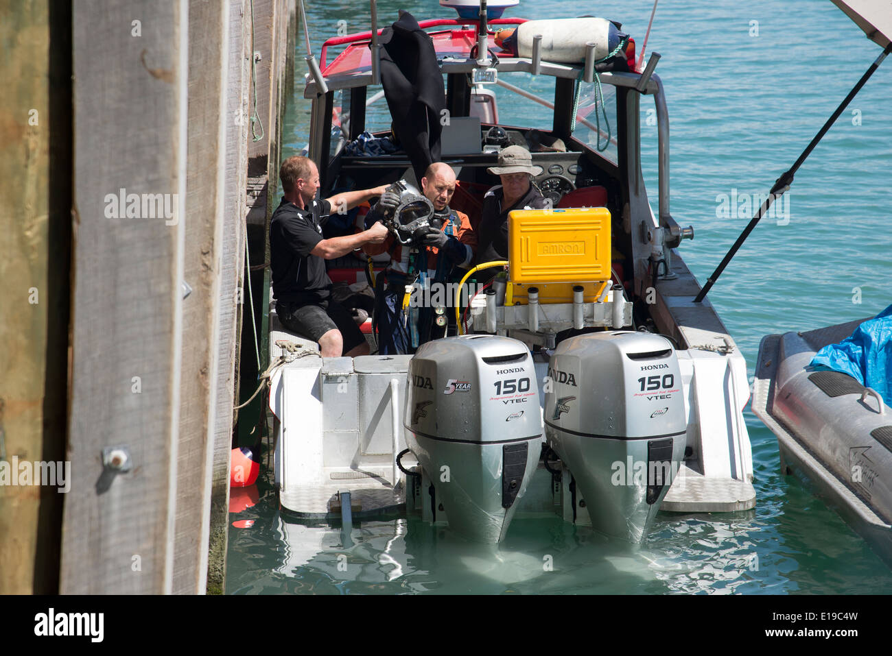 Commercial diver diving in Napier Port North Island New Zealand Stock ...