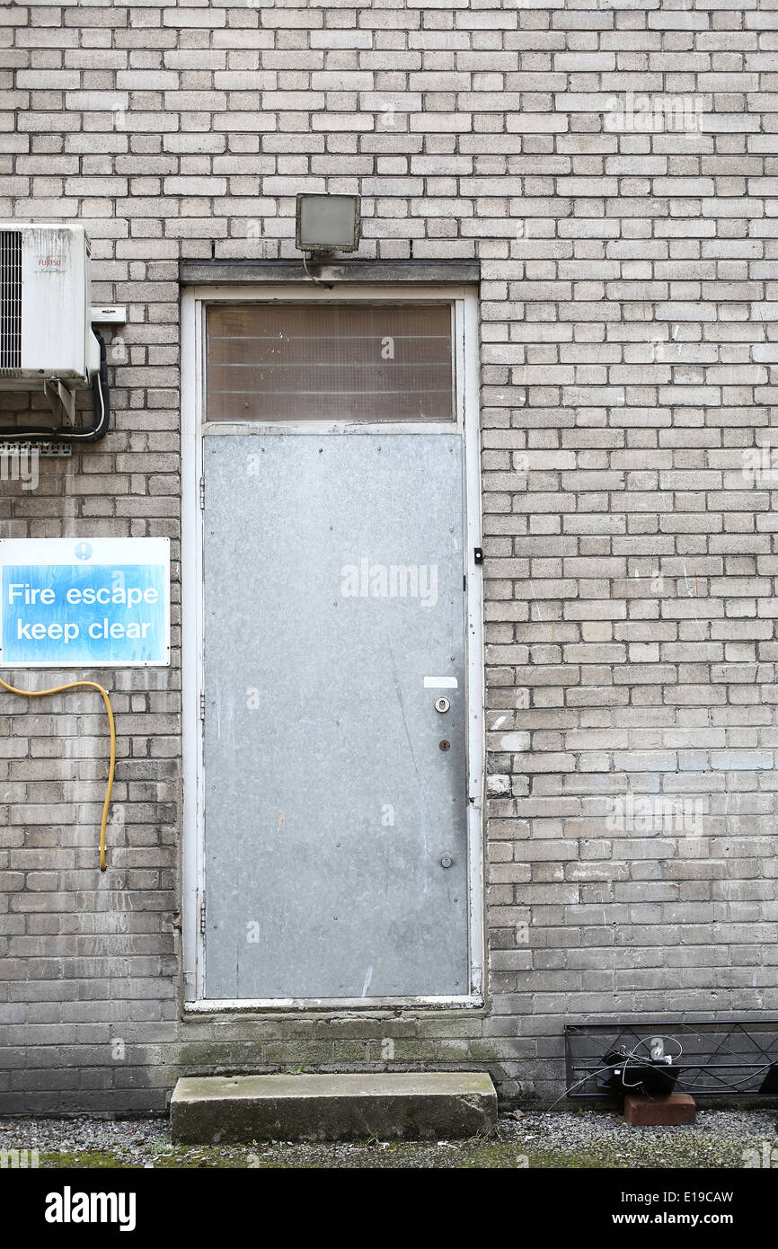 Fire exit door with step into the service yard at the back of a ...