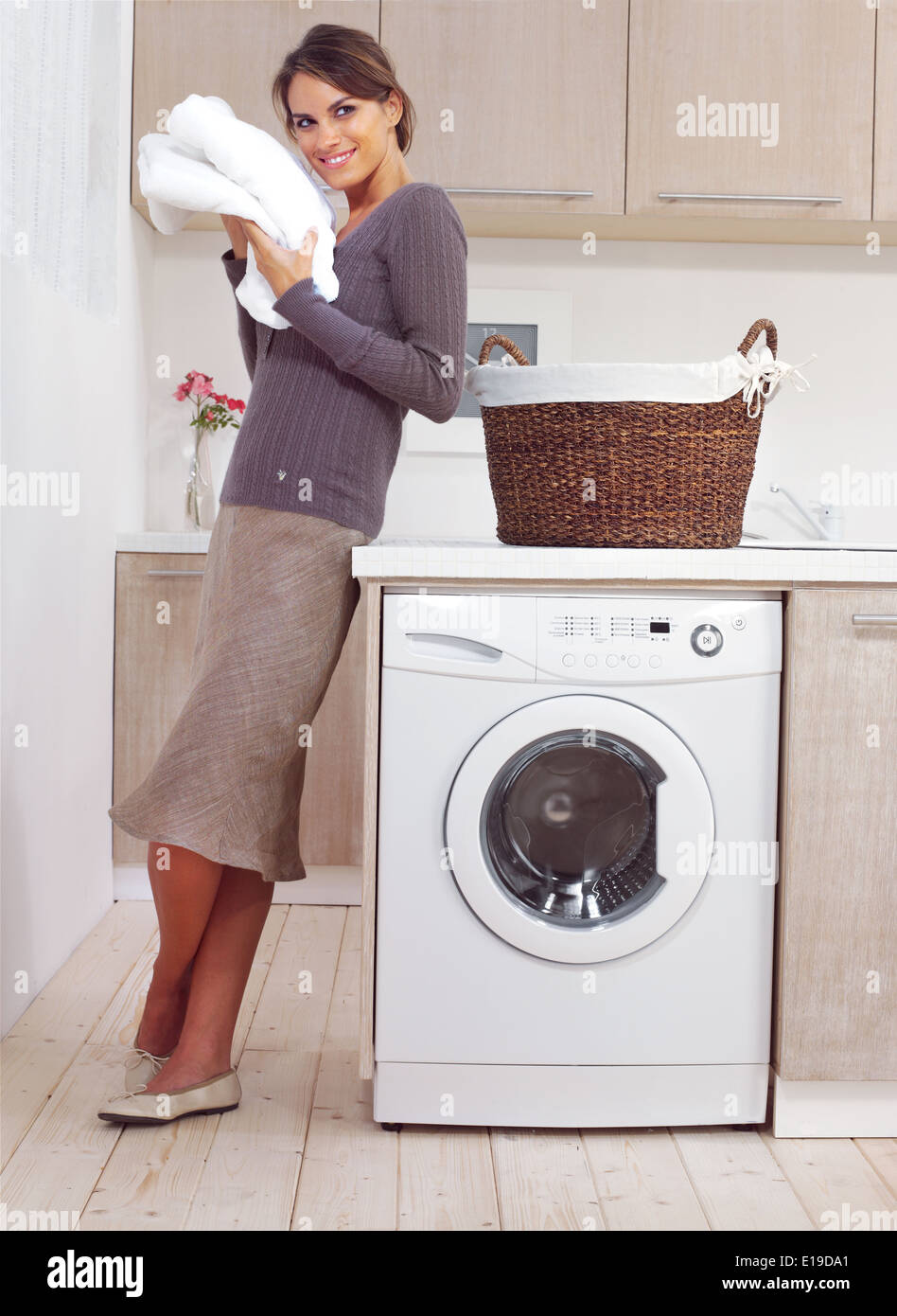 Woman washing machine hi-res stock photography and images - Alamy