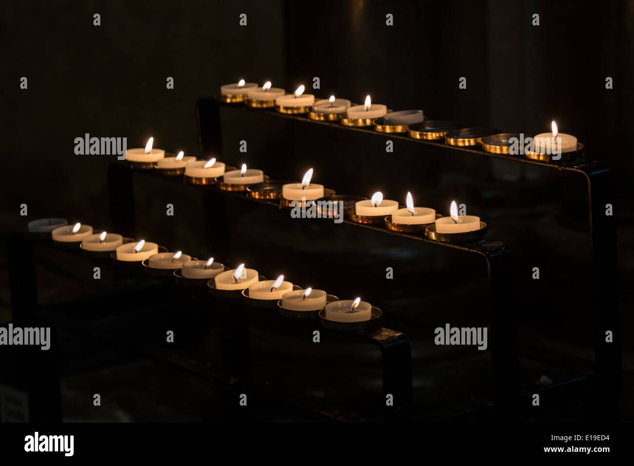 Rack of candles hi-res stock photography and images - Alamy