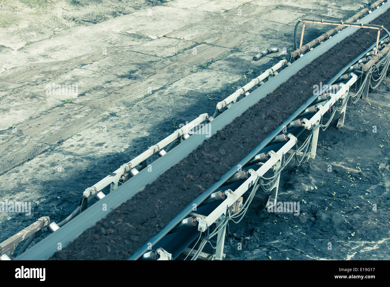 Open pit. Opencast brown coal mine. Belt conveyor as industrial detail ...