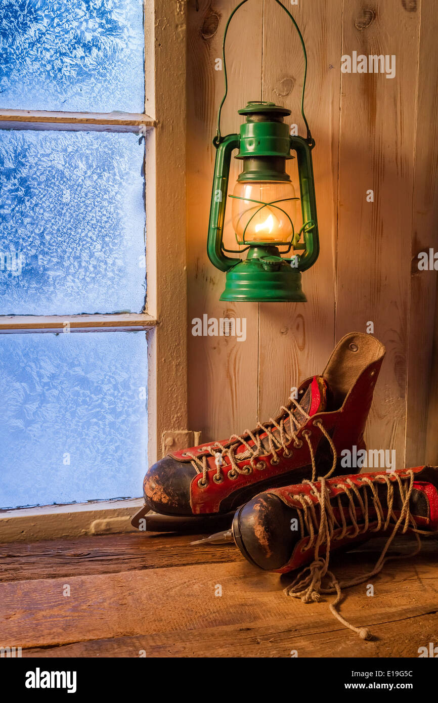 Warm cottage in a winter evening Stock Photo - Alamy