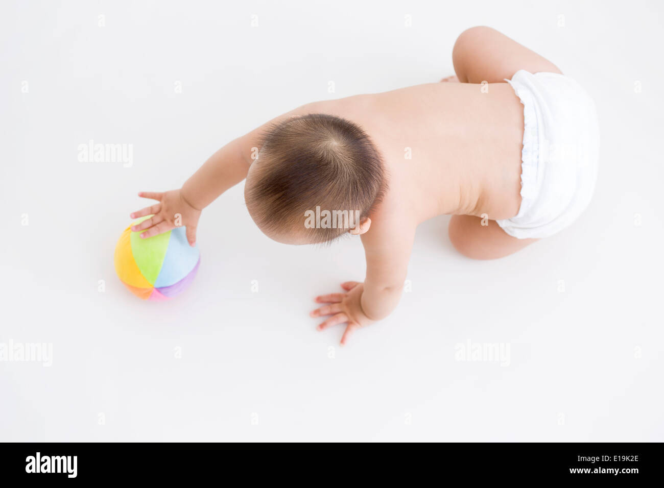 Cute baby boy with ball Stock Photo - Alamy