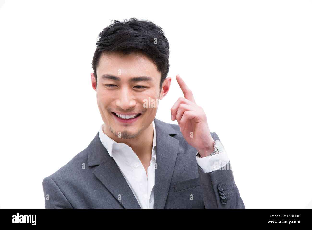 Fashionable businessman raising finger up Stock Photo - Alamy