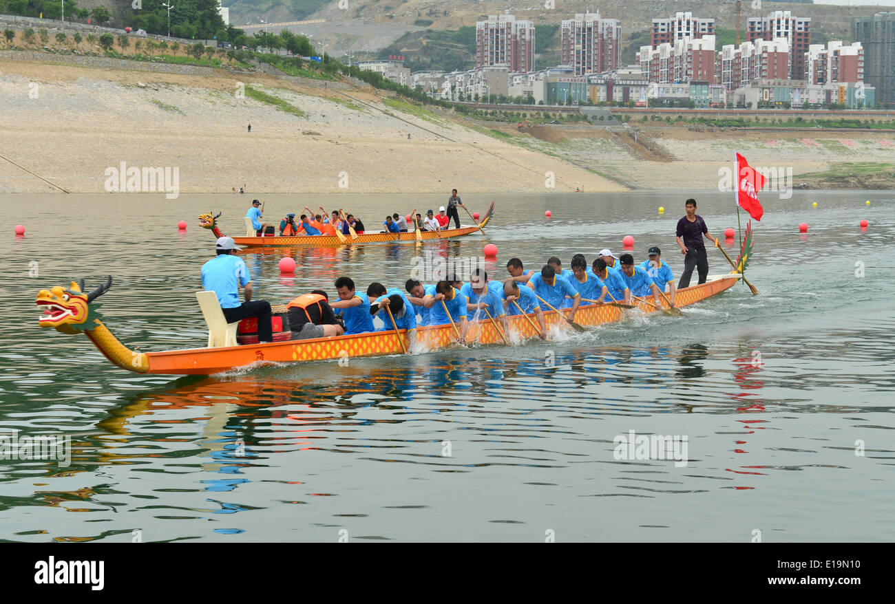 Zigui, Yichang, China . 28th May, 2014. Participants paddle in a ...