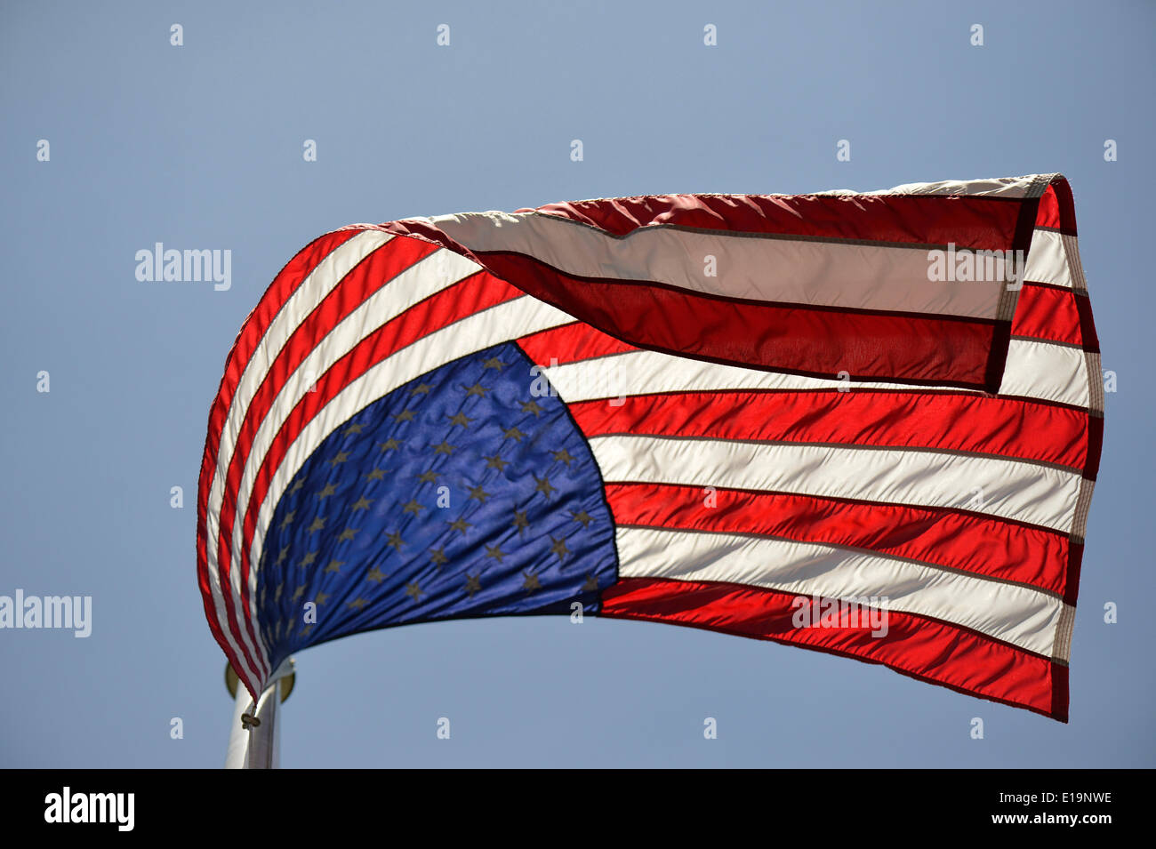 Merrick, New York, USA. 26th May, 2014. The American flag flies, waving ...