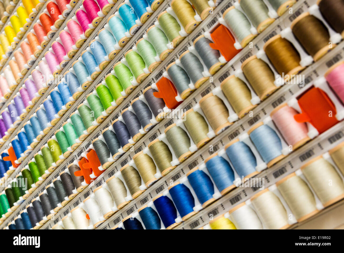 coloured thread multicoloured multi-coloured colours Stock Photo - Alamy