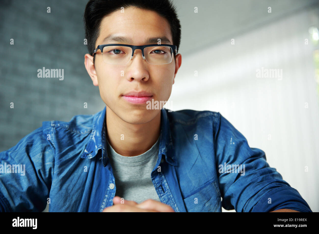 Portrait of a handsome asian man Stock Photo - Alamy