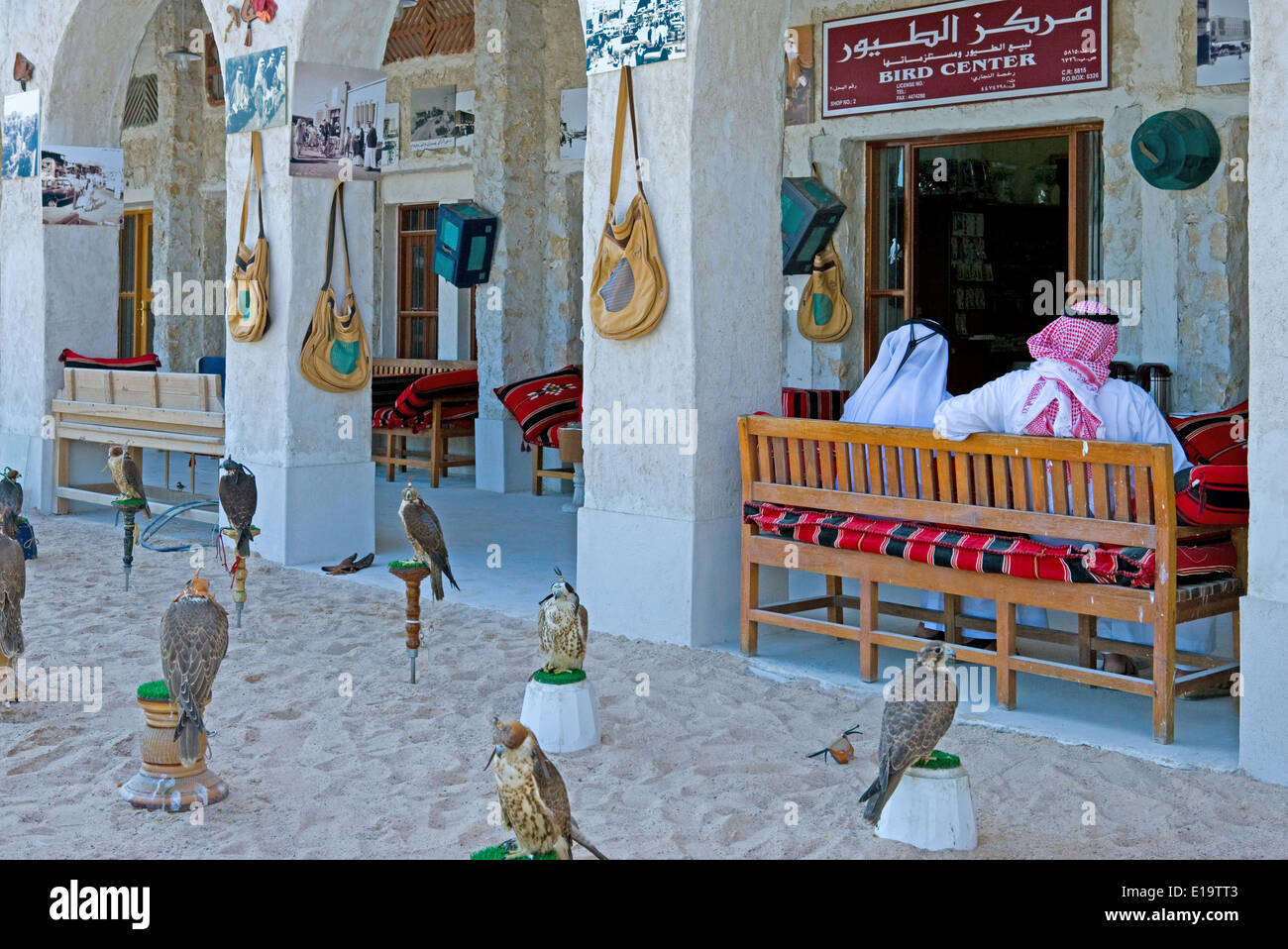 Qatar, Doha, local people and falcons in the Souq Wakif in the old city ...