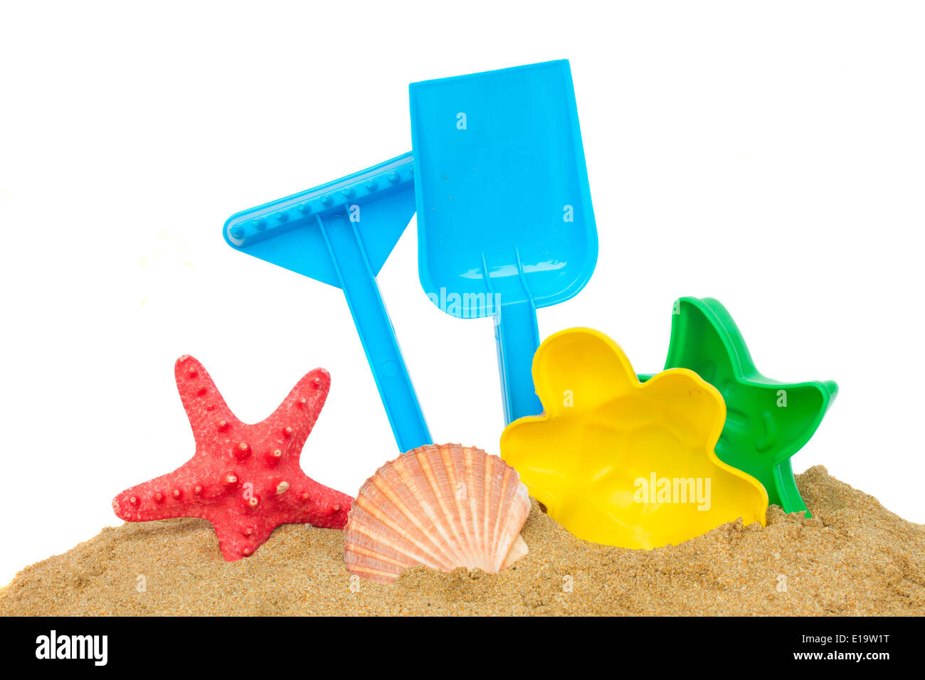 beach toys in sand Stock Photo - Alamy