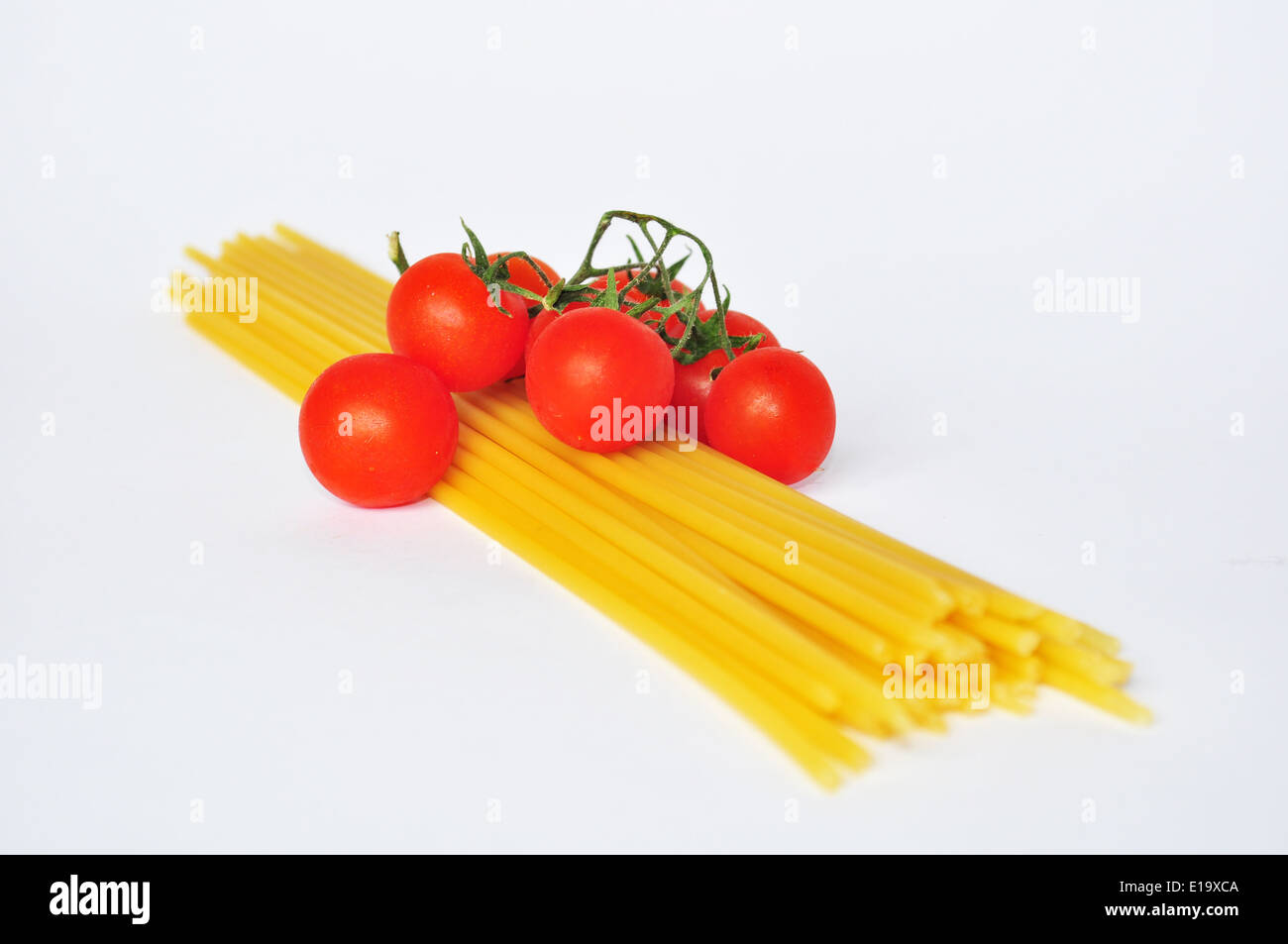 spaghetti and pachini isolated on white background Stock Photo - Alamy