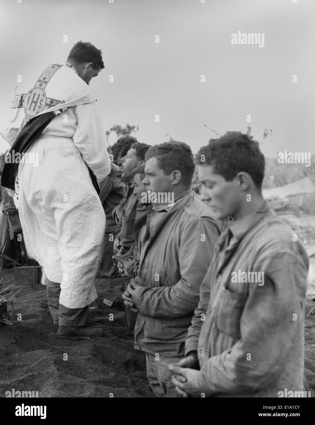 U.S. Marines and a Chaplain celebrate Catholic Communion during the ...