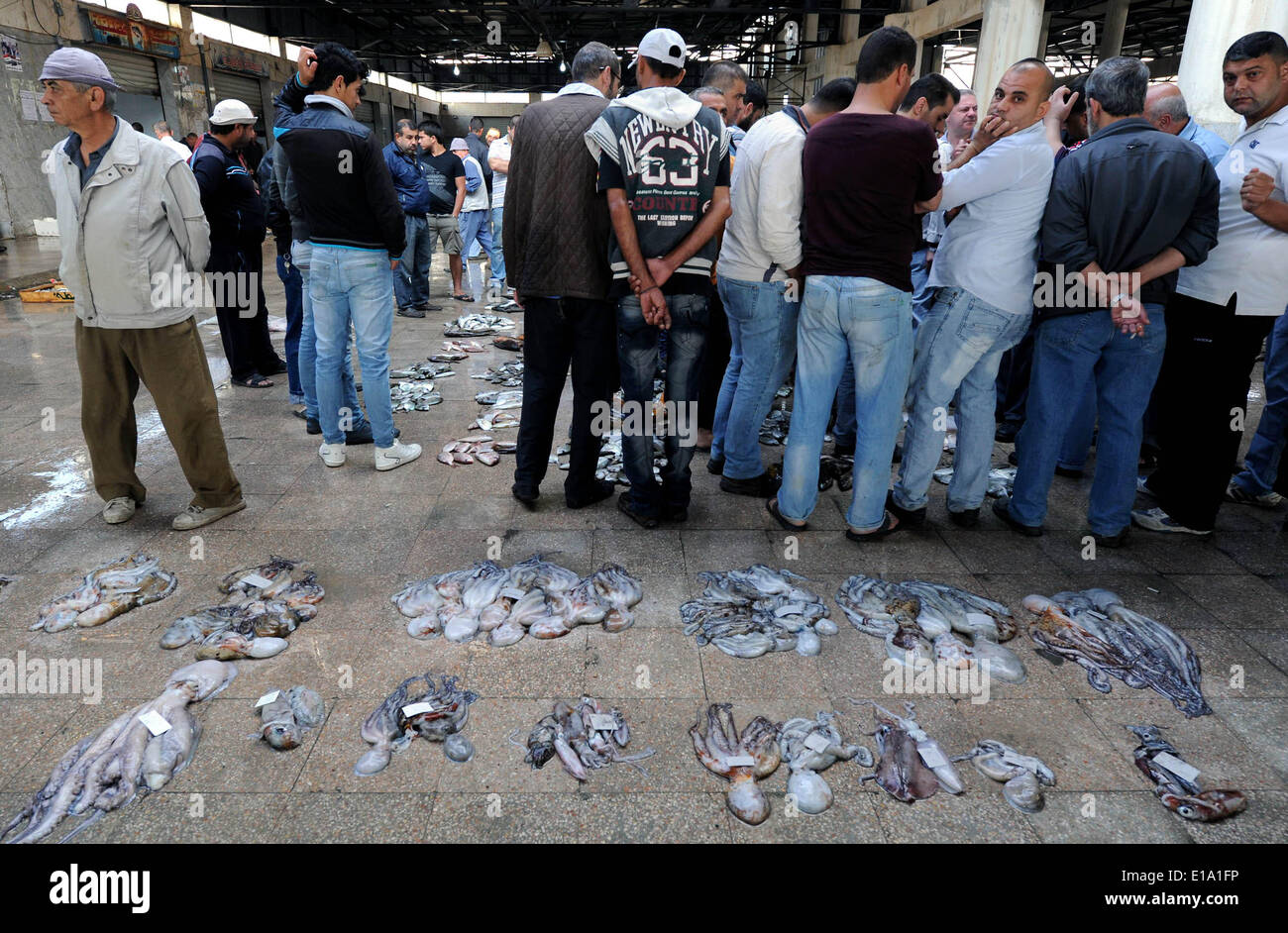 Lattakia, Syria. 26th May, 2014. Newly caught fish are seen at the ...