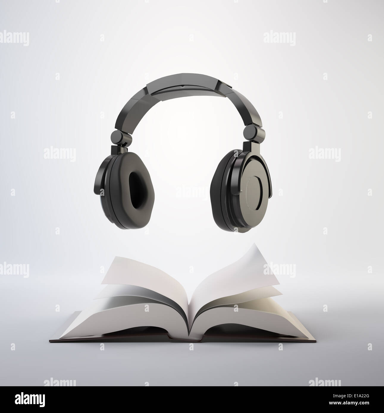 Open book with a headphone set - audiobook concept Stock Photo - Alamy