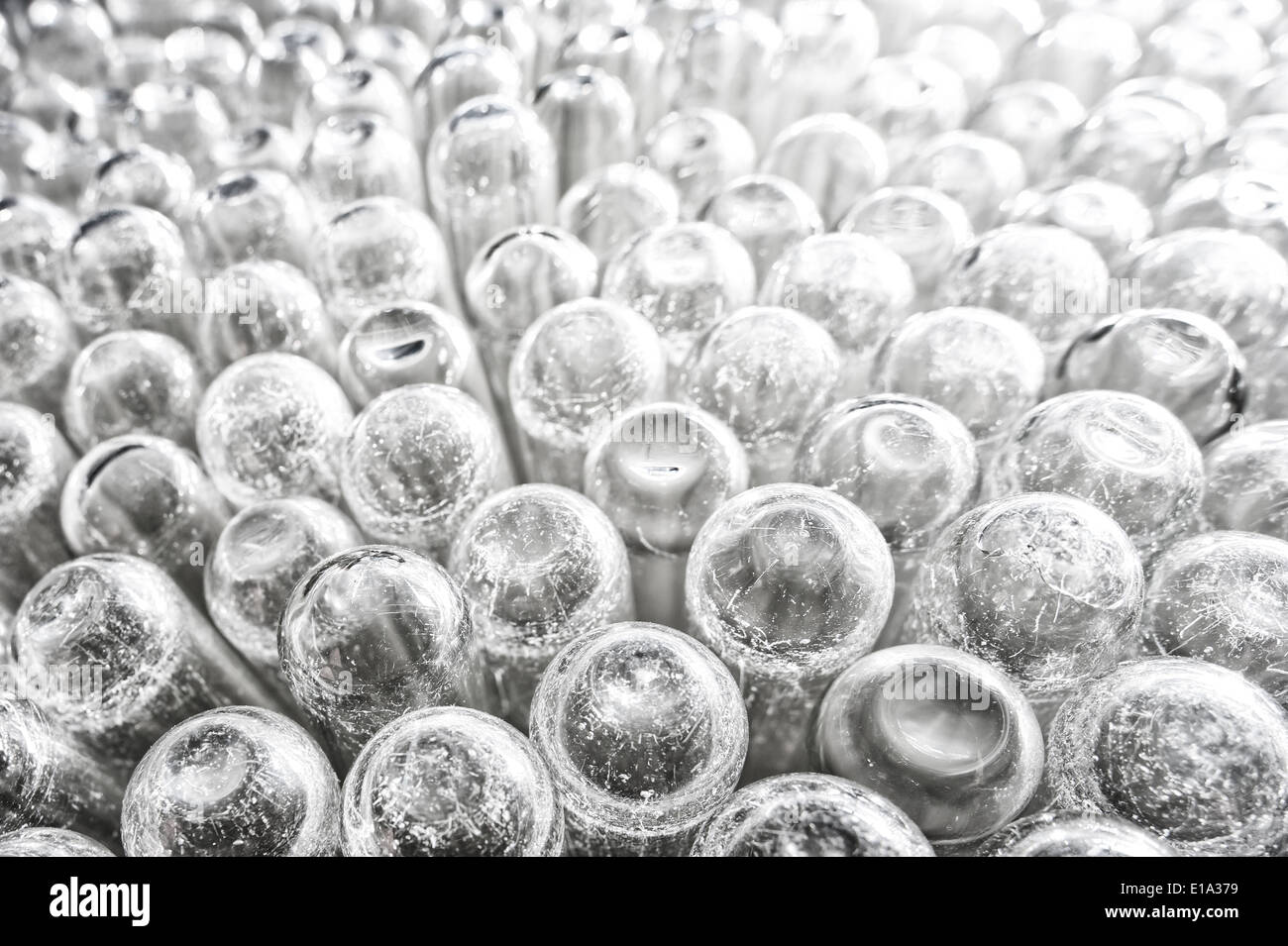 ends of upturned inverted test tubes well worn yet clean and sterilized ...