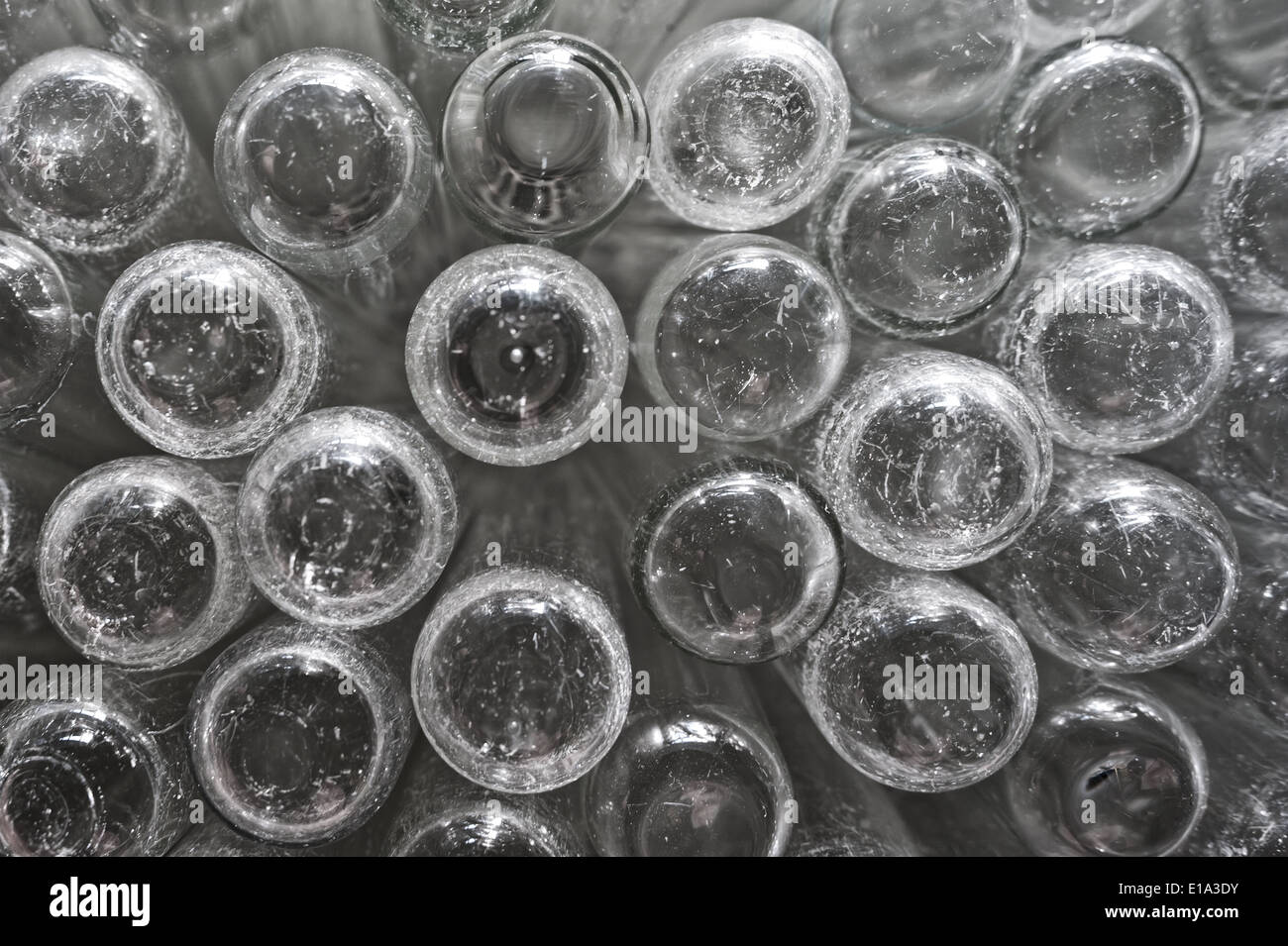 ends of upturned inverted test tubes well worn yet clean and sterilized ...