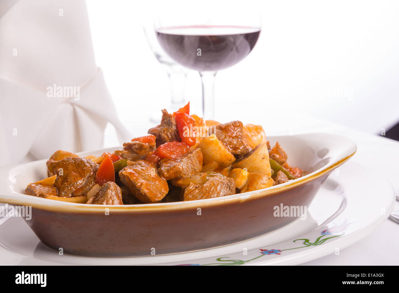 Beef Saute with tomatoes, mushrooms and onions served in oval baking ...