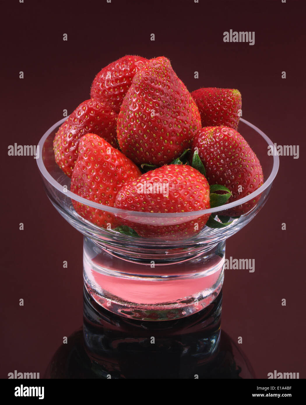 Fresh Strawberries in Glass Dish Stock Photo - Alamy